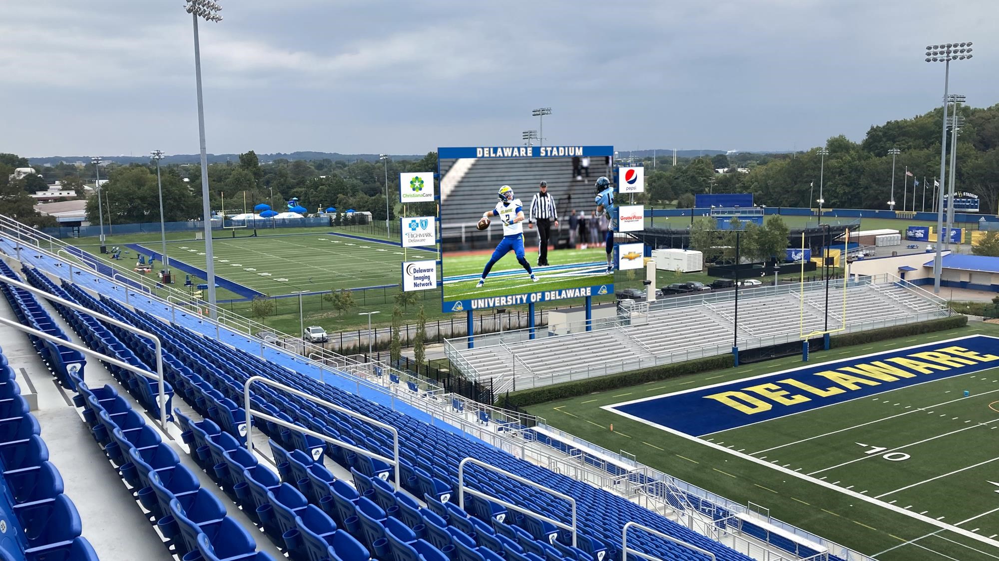 Delaware Stadium and Grant Stadium will welcome fans with nearly 3,000 ...